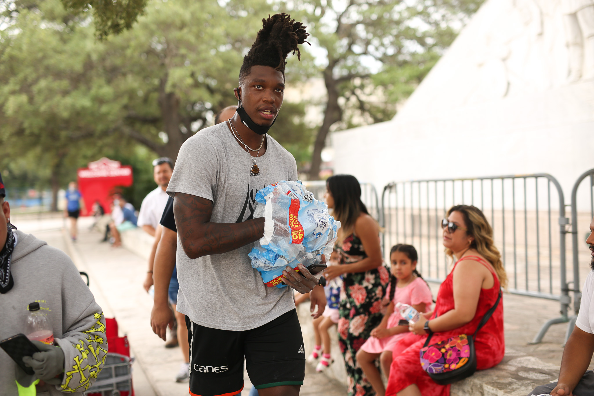 Volunteers Aid Cleanup Downtown After Night of Vandalism, Looting