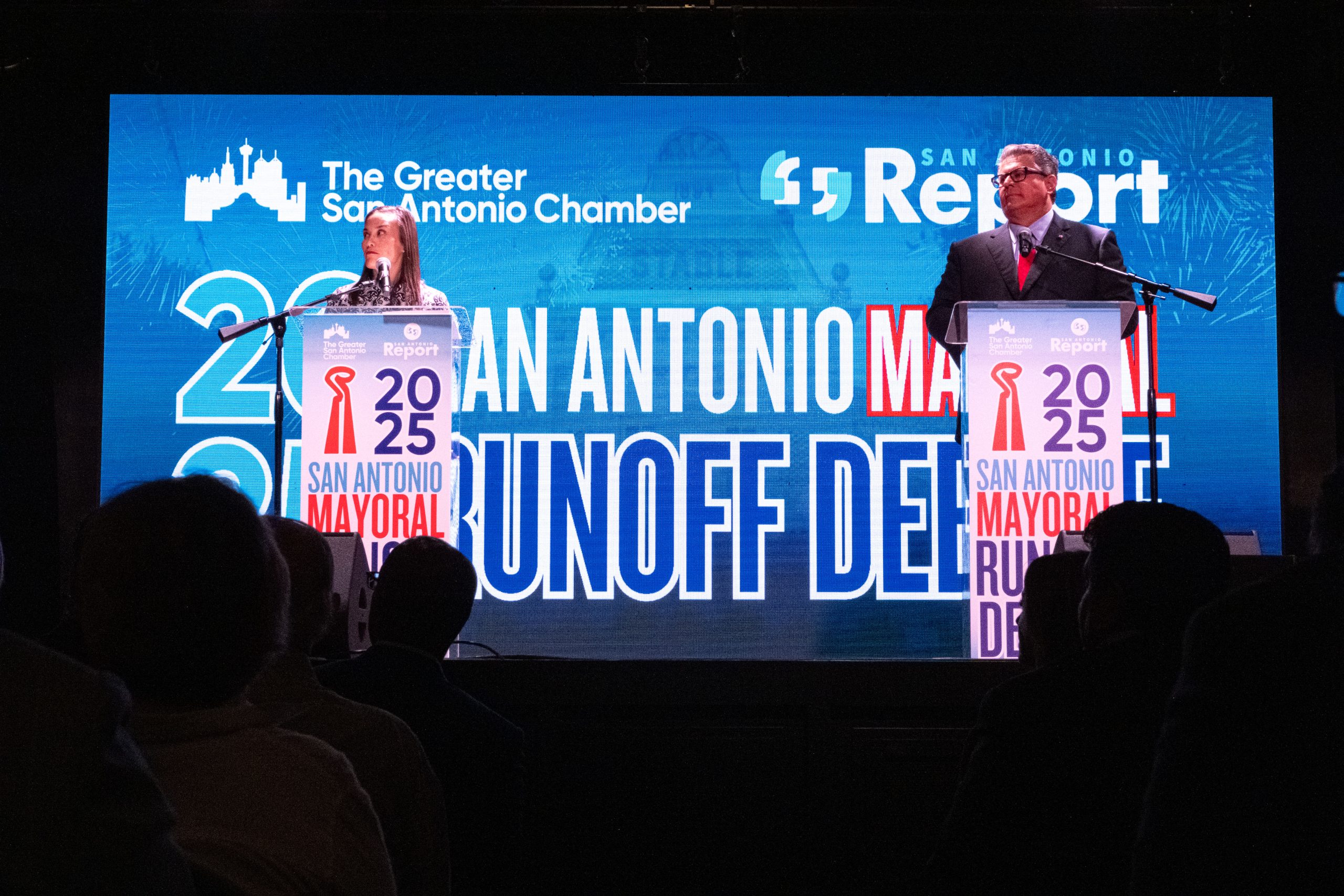 Mayoral candidates take aim at each other's backgrounds in debate